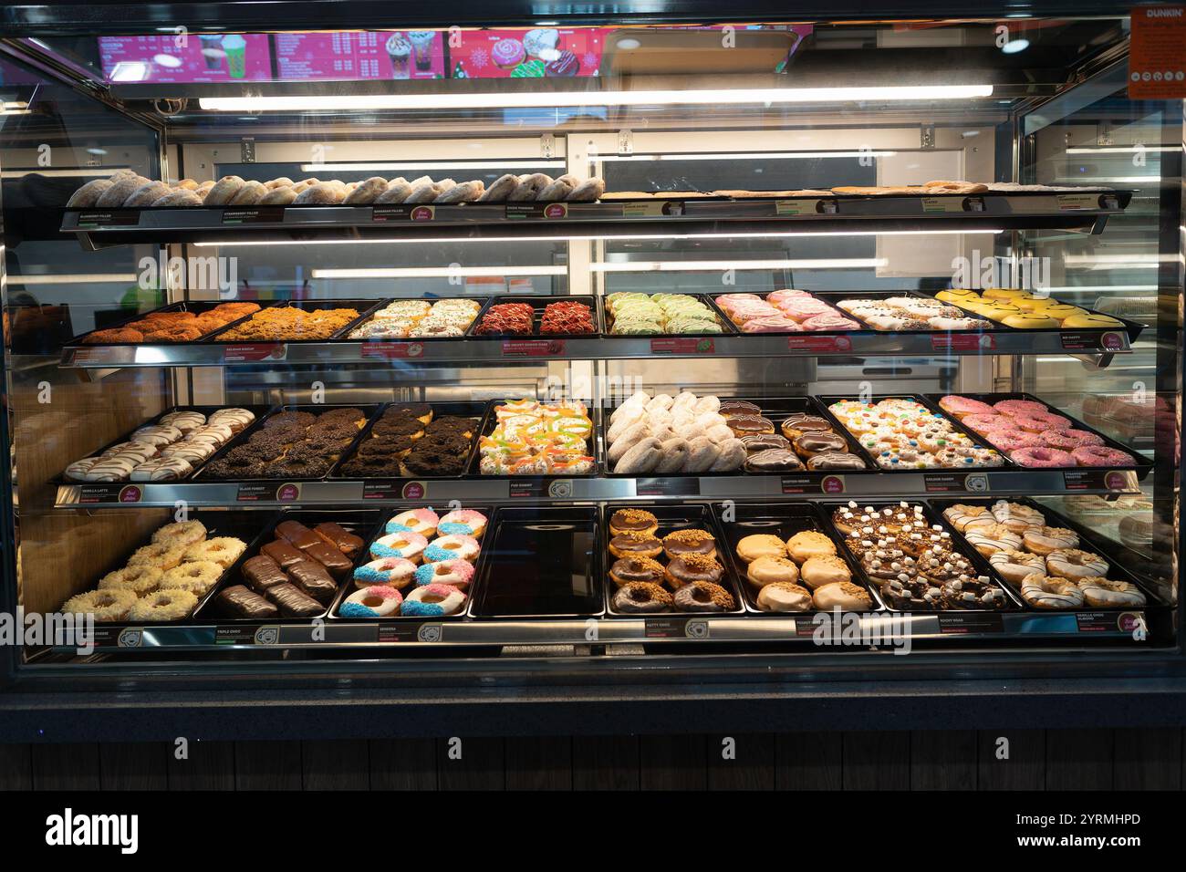 KUALA LUMPUR, MALAYSIA - NOVEMBER 28, 2023: various donuts displayed in ...