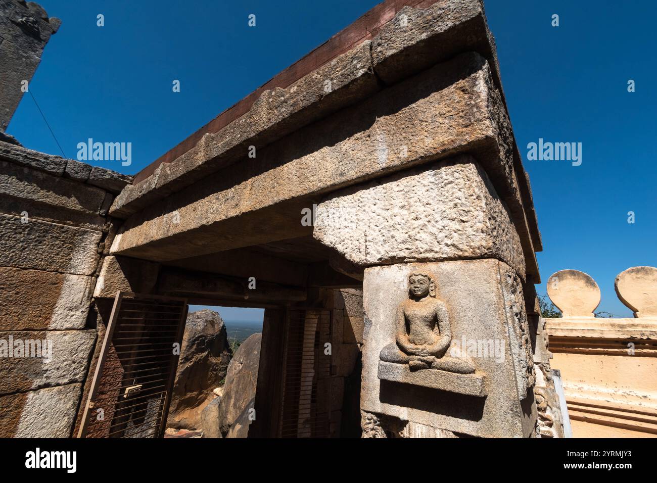 A Jain Tirthankara statue carved in stone in the sacred town of ...