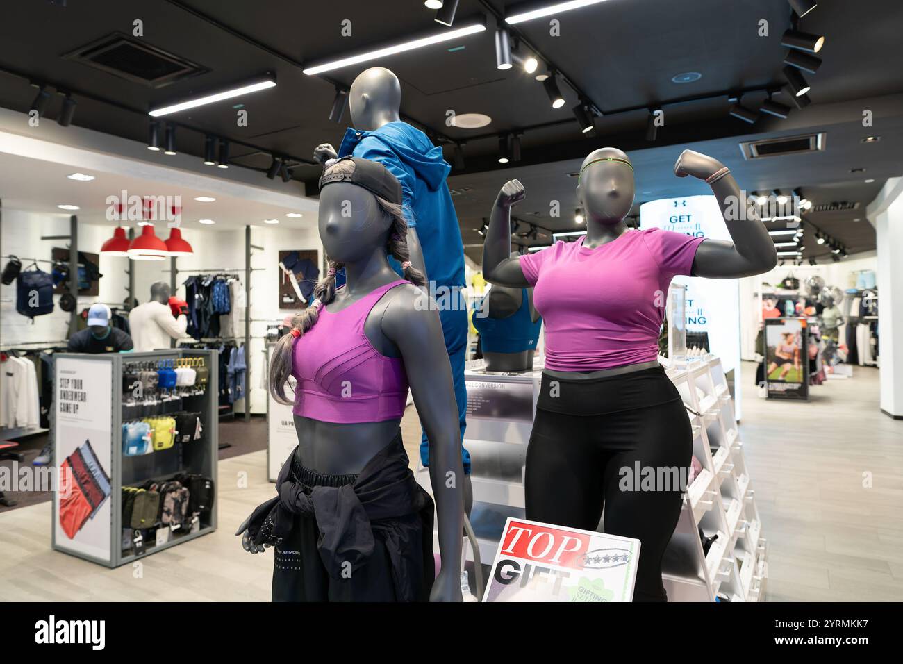 KUALA LUMPUR, MALAYSIA - DECEMBER 01, 2023: dressed mannequins on display at Under Armour store ...