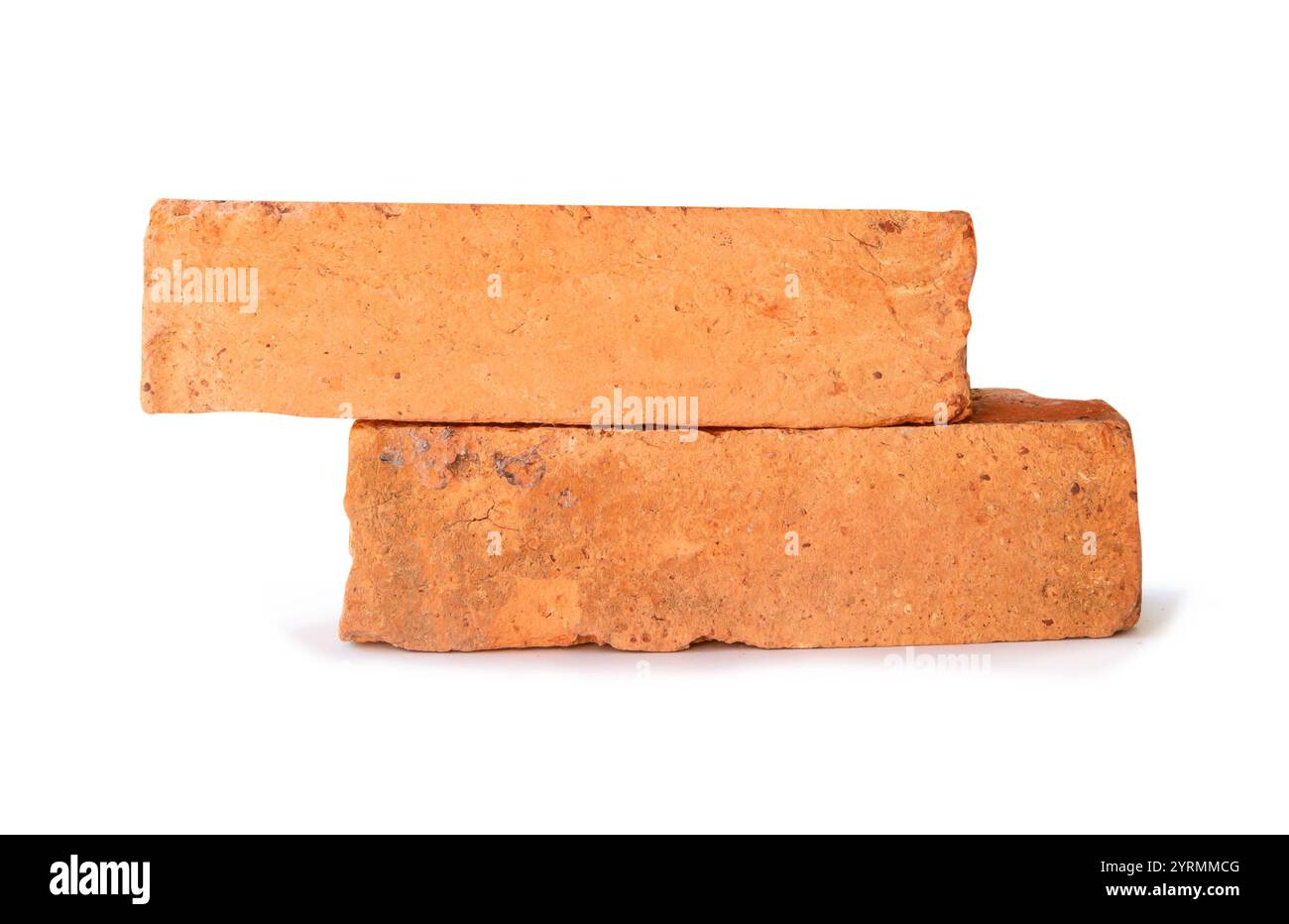 Side view of two old red or orange bricks in stack is isolated on white ...