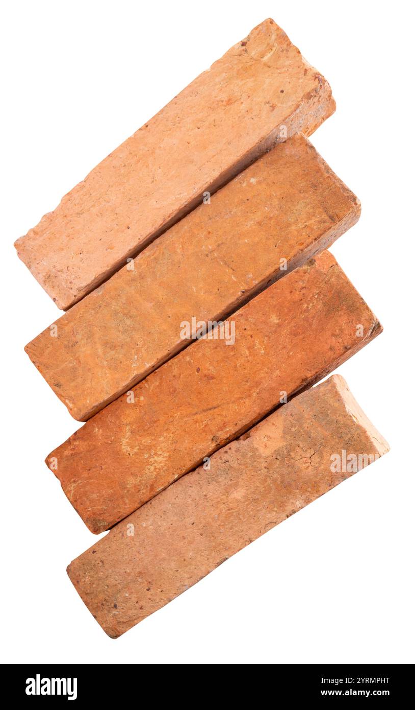 Top view of four old red or orange bricks in stack is isolated on white ...