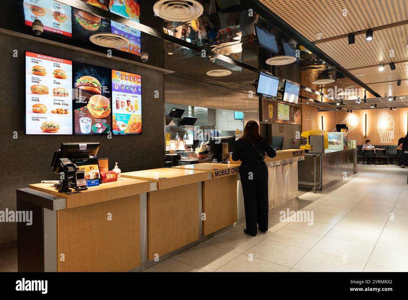 KUALA LUMPUR, MALAYSIA - DECEMBER 01, 2023: the service counter at a ...