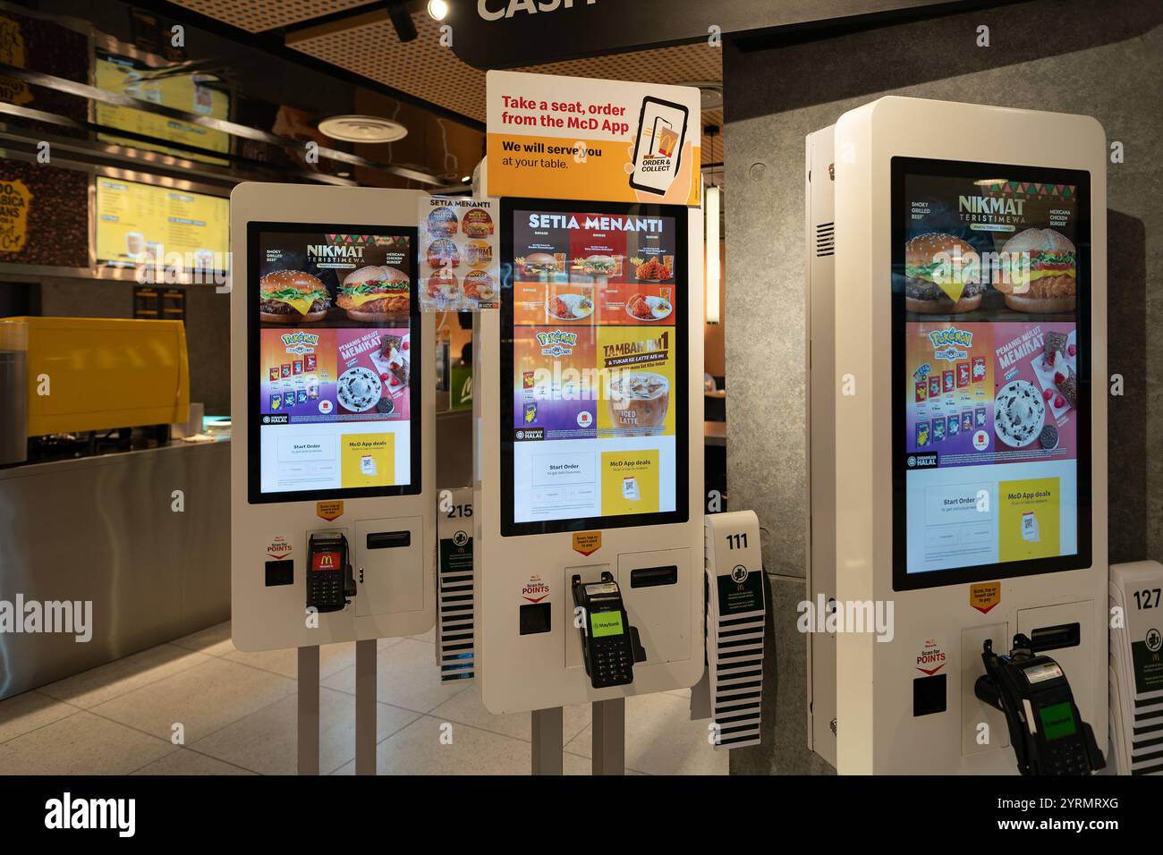 KUALA LUMPUR, MALAYSIA - DECEMBER 01, 2023: self-service kiosks at ...