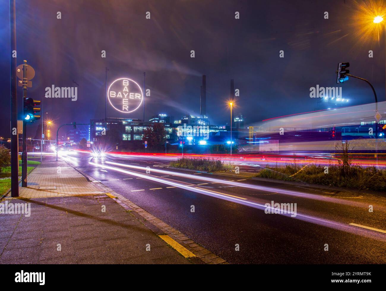 Bayer sign at night hi-res stock photography and images - Alamy