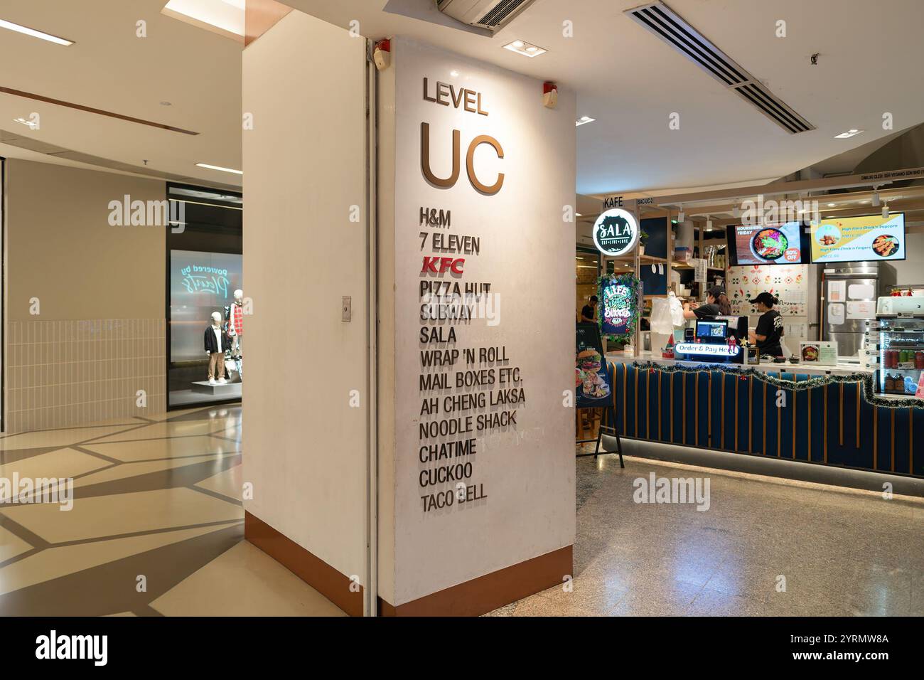 KUALA LUMPUR, MALAYSIA - DECEMBER 01, 2023: a list of stores and ...