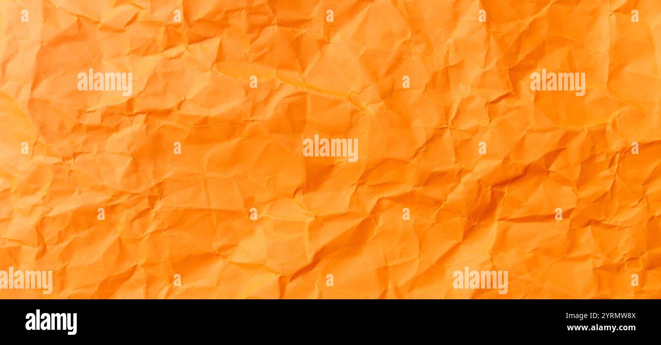 Top view and full frame of wrinkled or crumpled orange paper is used as ...