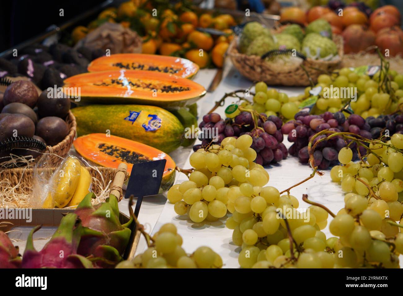 market stall with grapes, tangerines and exotic fruits Stock Photo - Alamy
