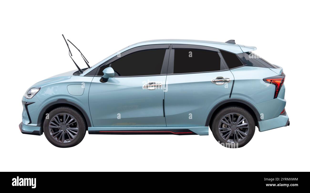 Side view of light blue mini or small electric hatchback car is ...