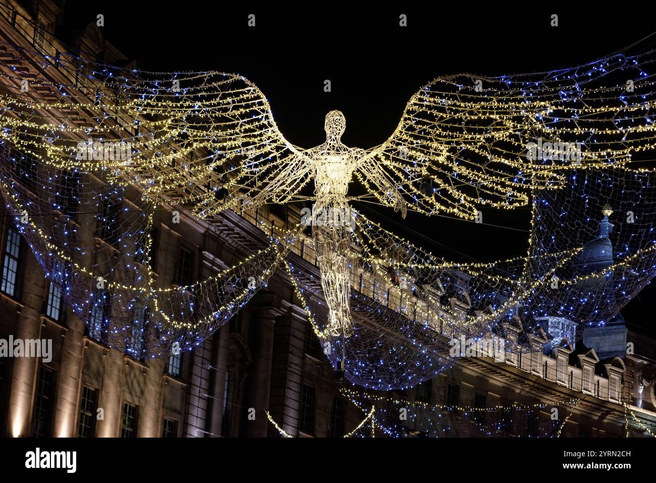 Angels in Christmas lights along Regent Street, London, England Stock ...