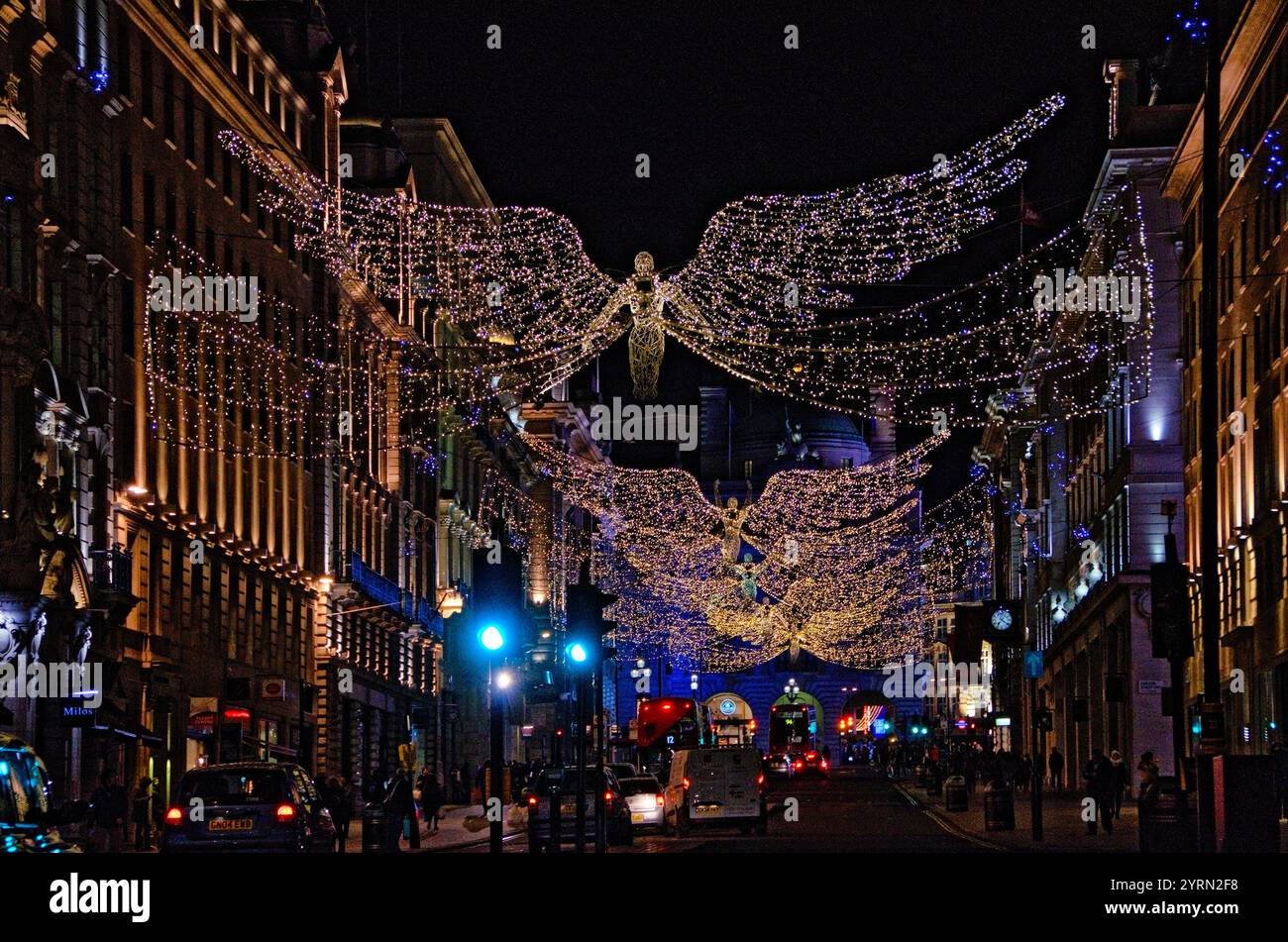 Angels in Christmas lights along Regent Street, London, England Stock ...
