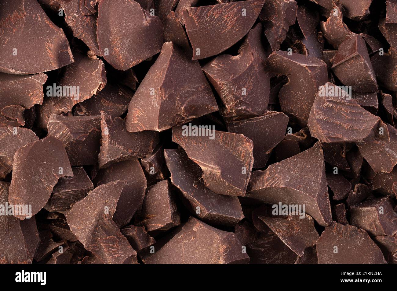 pieces of dark chocolate, sweet food background Stock Photo - Alamy
