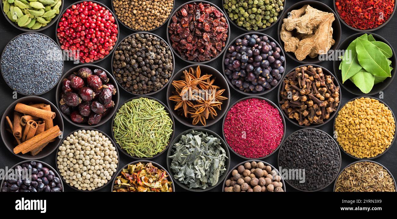 Spices and herbs background. Large set of seasoning top view. Colorful ...