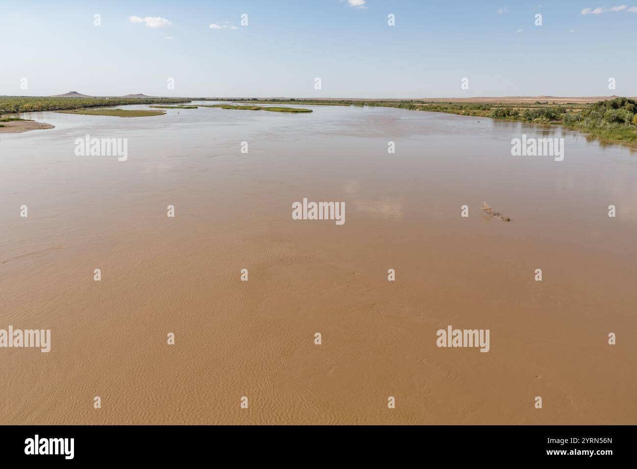 The vast Amu Darya River flows gracefully near Kipchak village ...