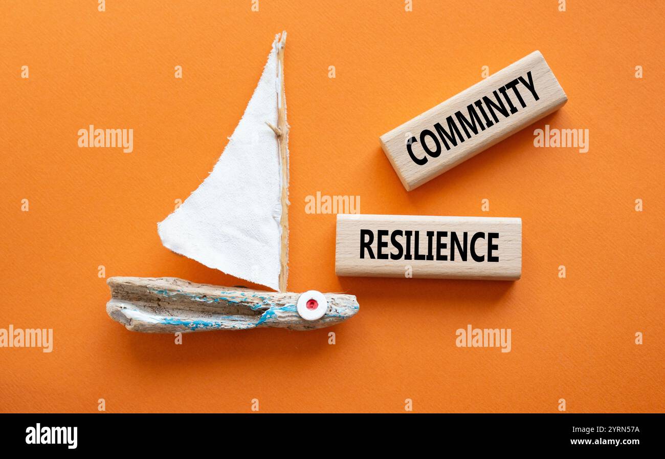 Community Resilience symbol. Wooden blocks with words Community ...