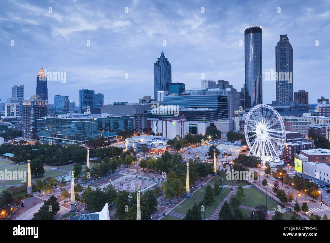 USA, Georgia, Atlanta, Centenial Olympic Park, elevated city view with ferris wheel, dusk Stock ...