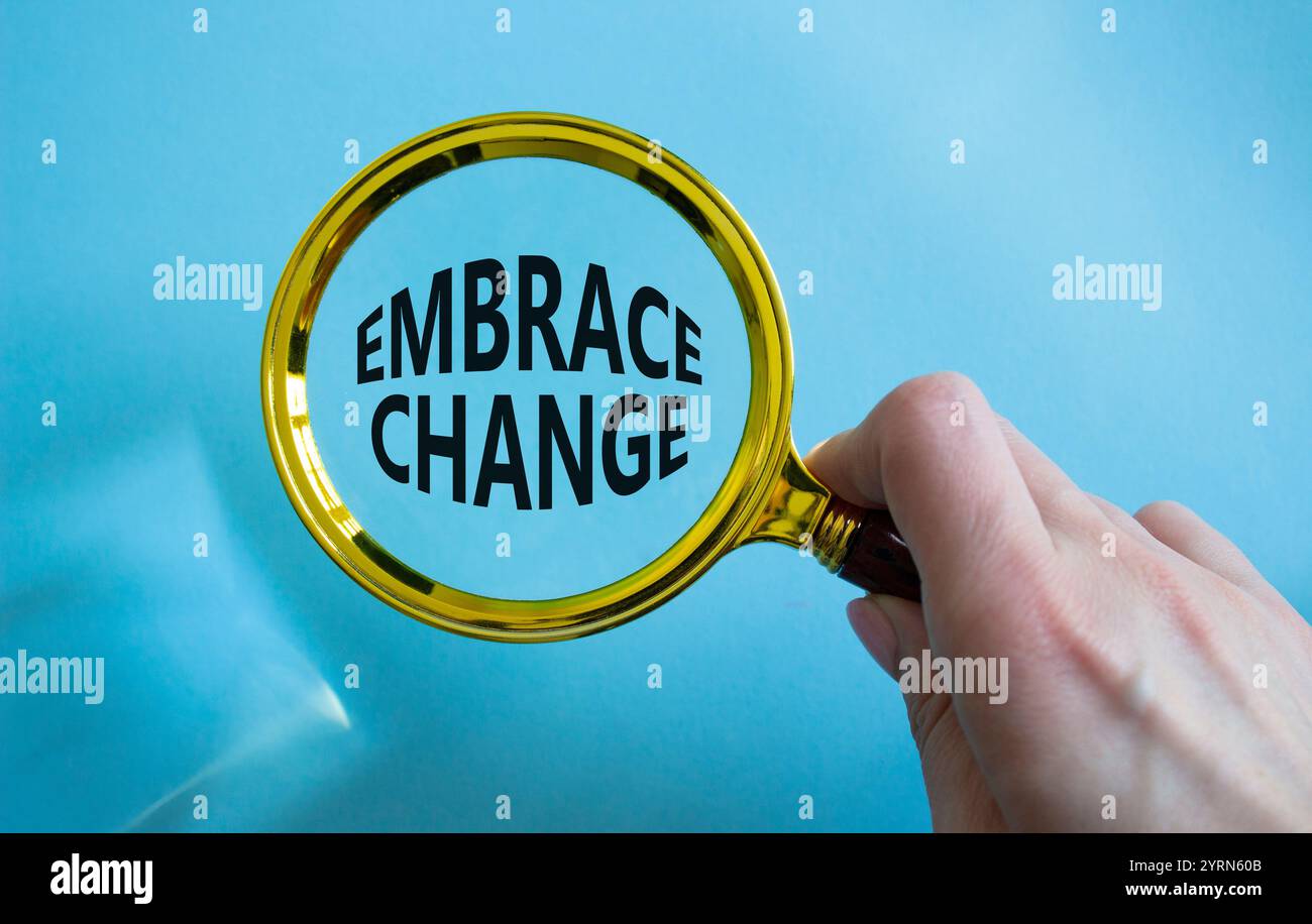 Embrace change symbol. Concept word Embrace change with Magnifying ...