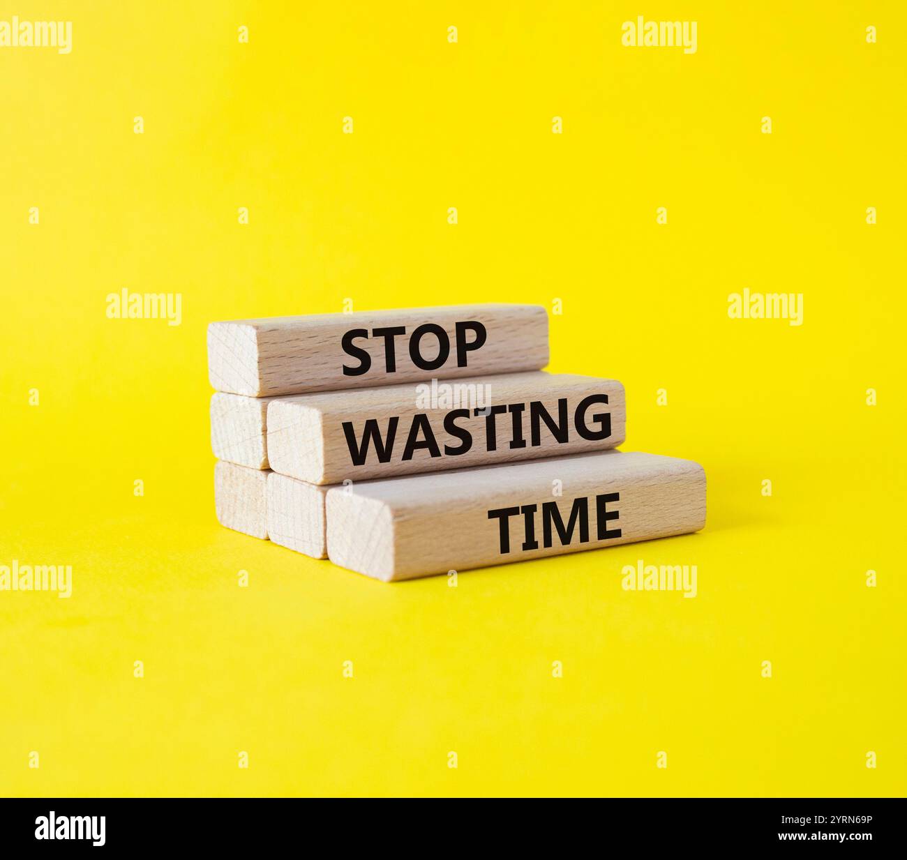 Stop Wasting Time symbol. Wooden blocks with words Stop Wasting Time ...