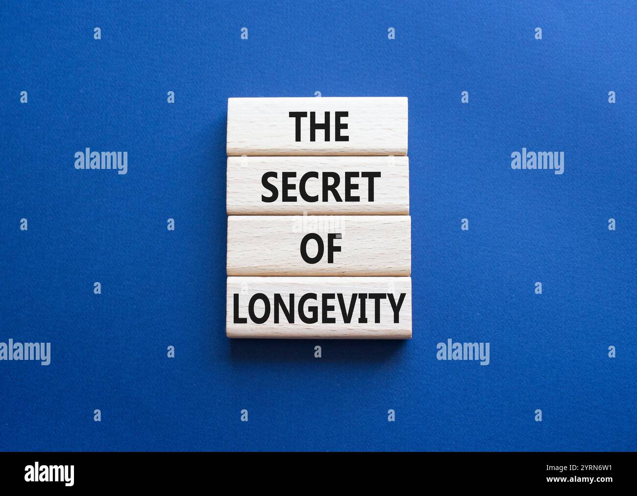 The Secret of Longevity symbol. Wooden blocks with words The Secret of ...