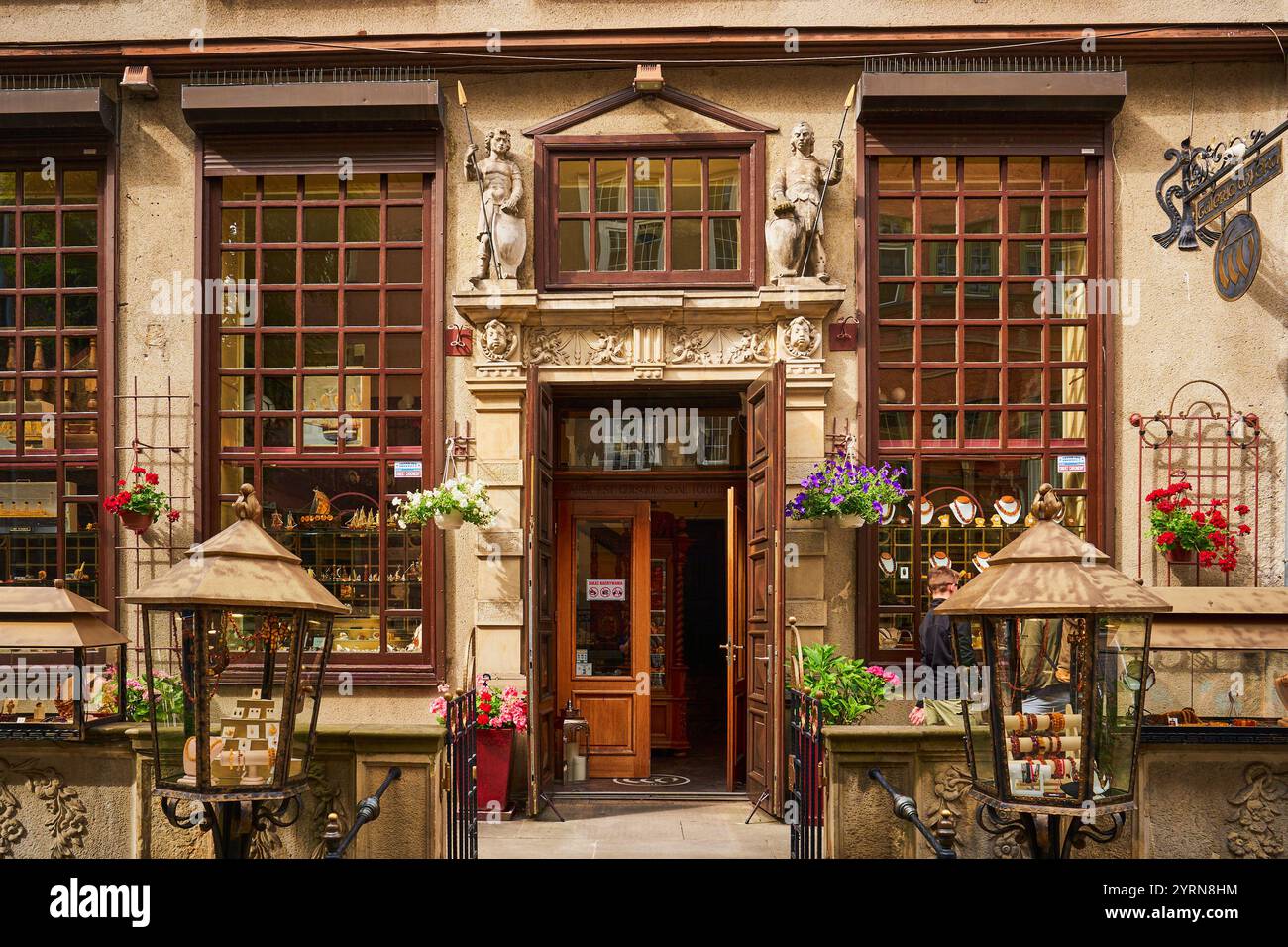 A charming storefront in Gdansk featuring ornate architectural details ...