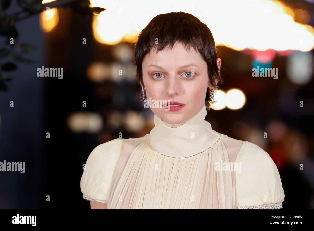 Emma Corrin poses for photographers upon arrival at the premiere of the ...