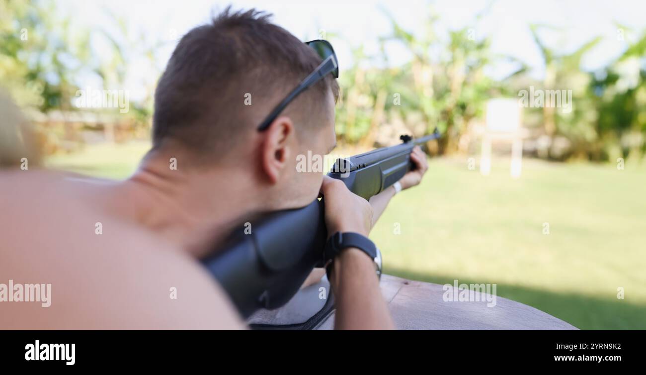 Silhouette shooter aiming outdoor range hi-res stock photography and ...