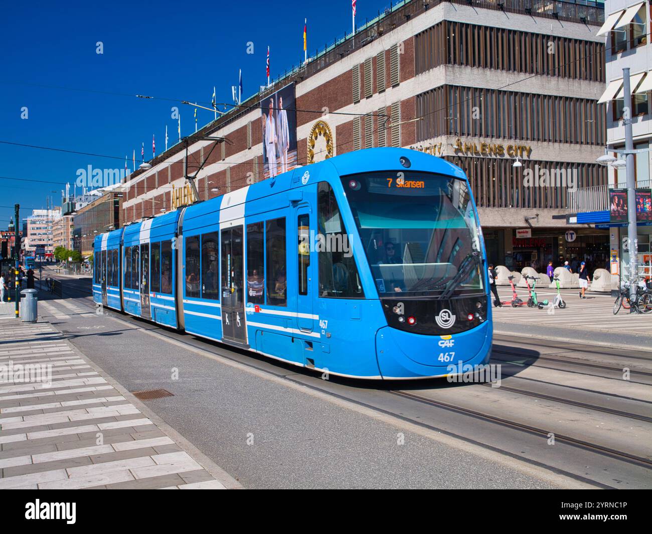Stockholm, Sweden - Jun 25 2024: A blue tram on the Stockholm tramway ...