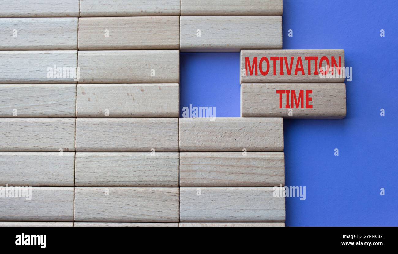 Motivation Time symbol. Concept word Motivation Time on wooden blocks ...