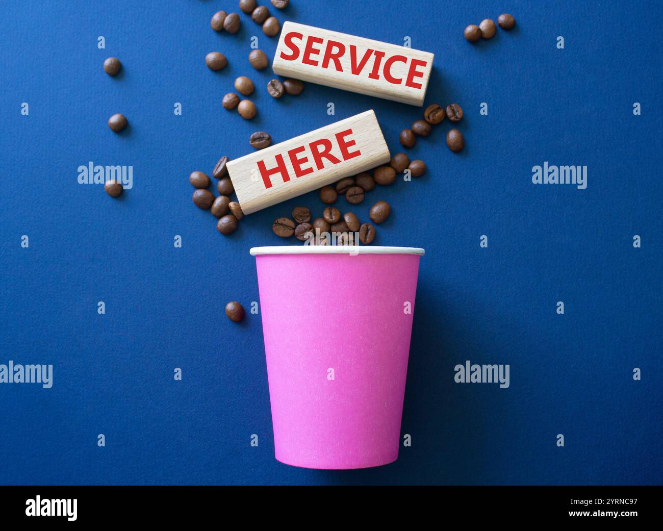 Service here symbol. Concept words Service here on wooden blocks ...