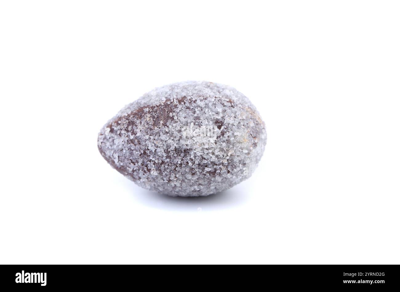 Chocolate stone powdered sugar. Close up. White background Stock Photo ...