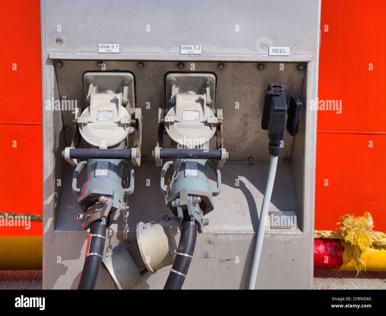 `Bodo, Norway - 18 June 2024: Two electrical cables connected to ...