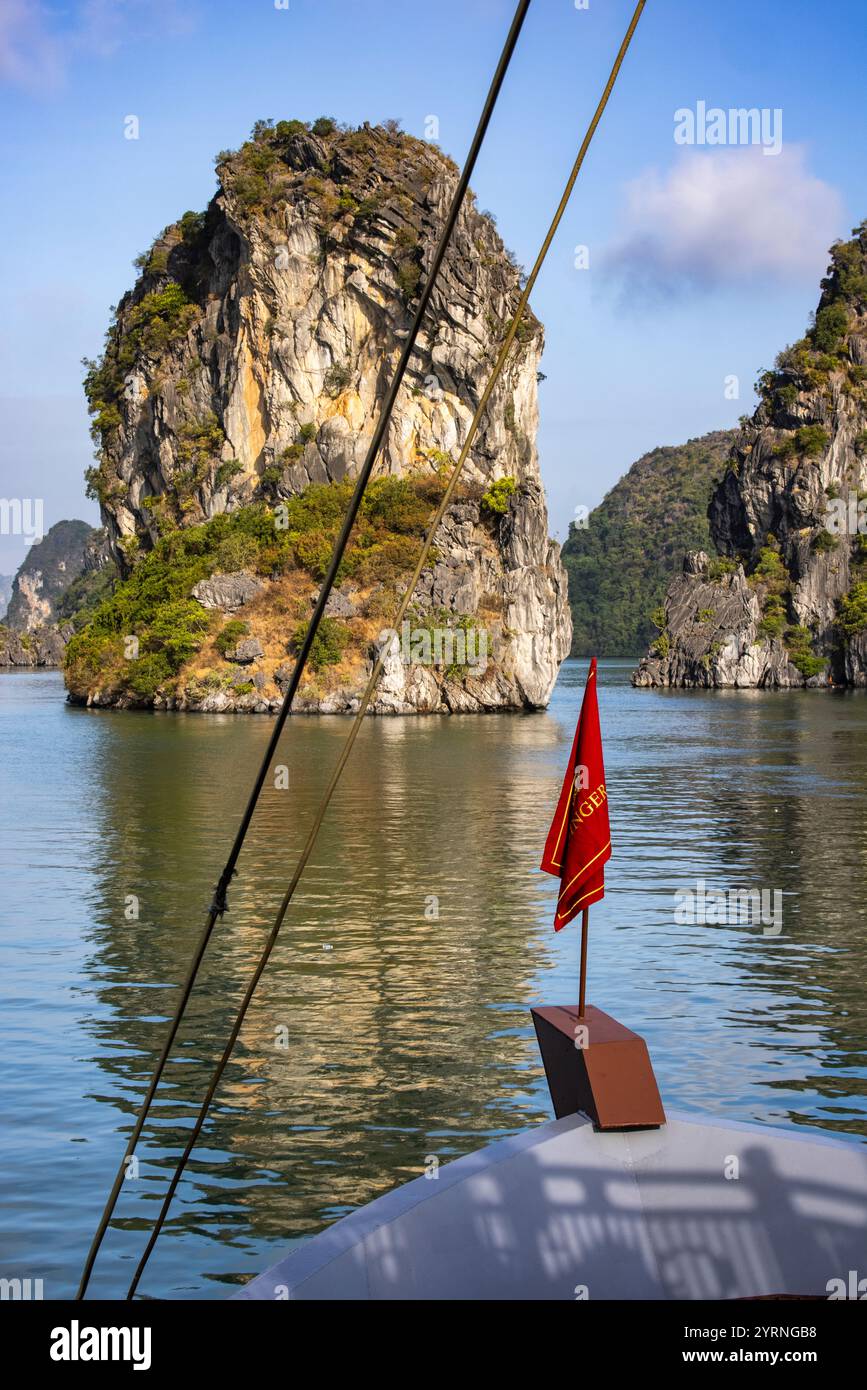 Bow of the boutique cruise ship Ginger (Heritage Line) and karst ...