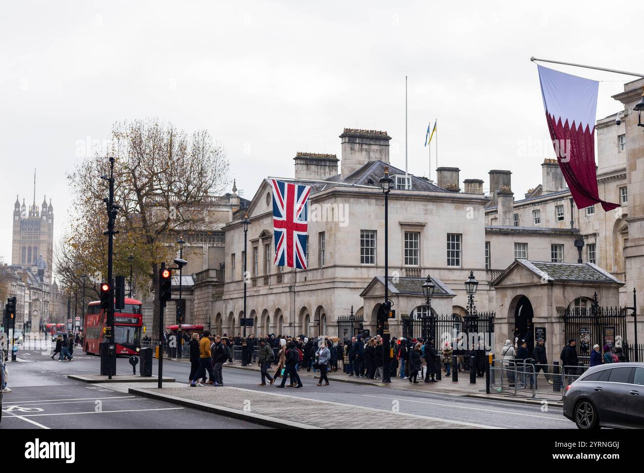 The Union Jack and Qatar's flag fly side by side atop the Royal Horse ...