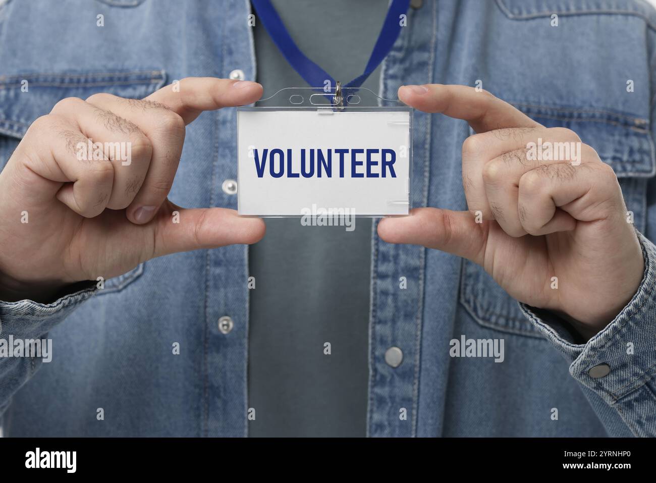 Man with badge hi-res stock photography and images - Alamy