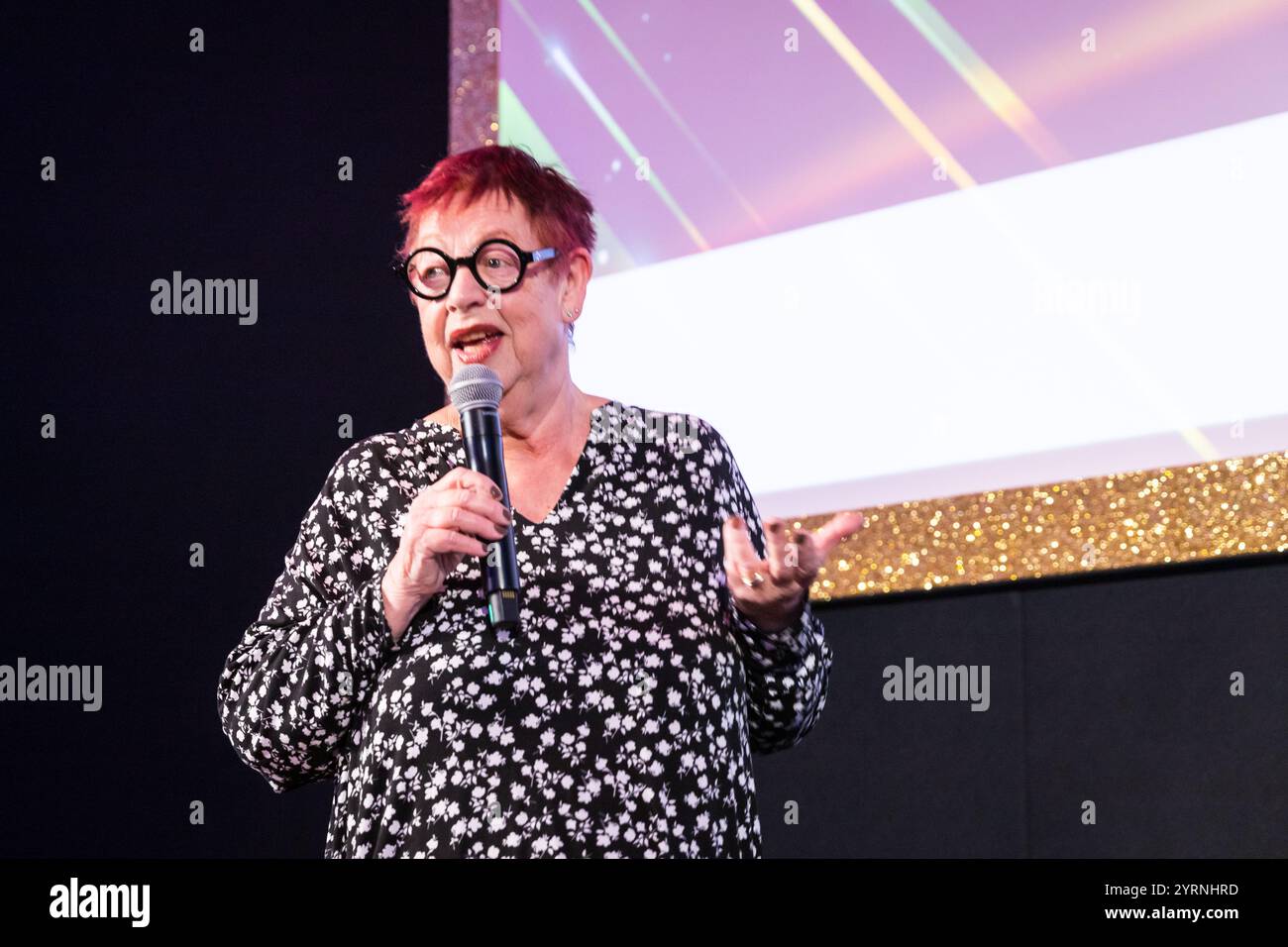 Jo Brand speaking in a microphone Stock Photo - Alamy