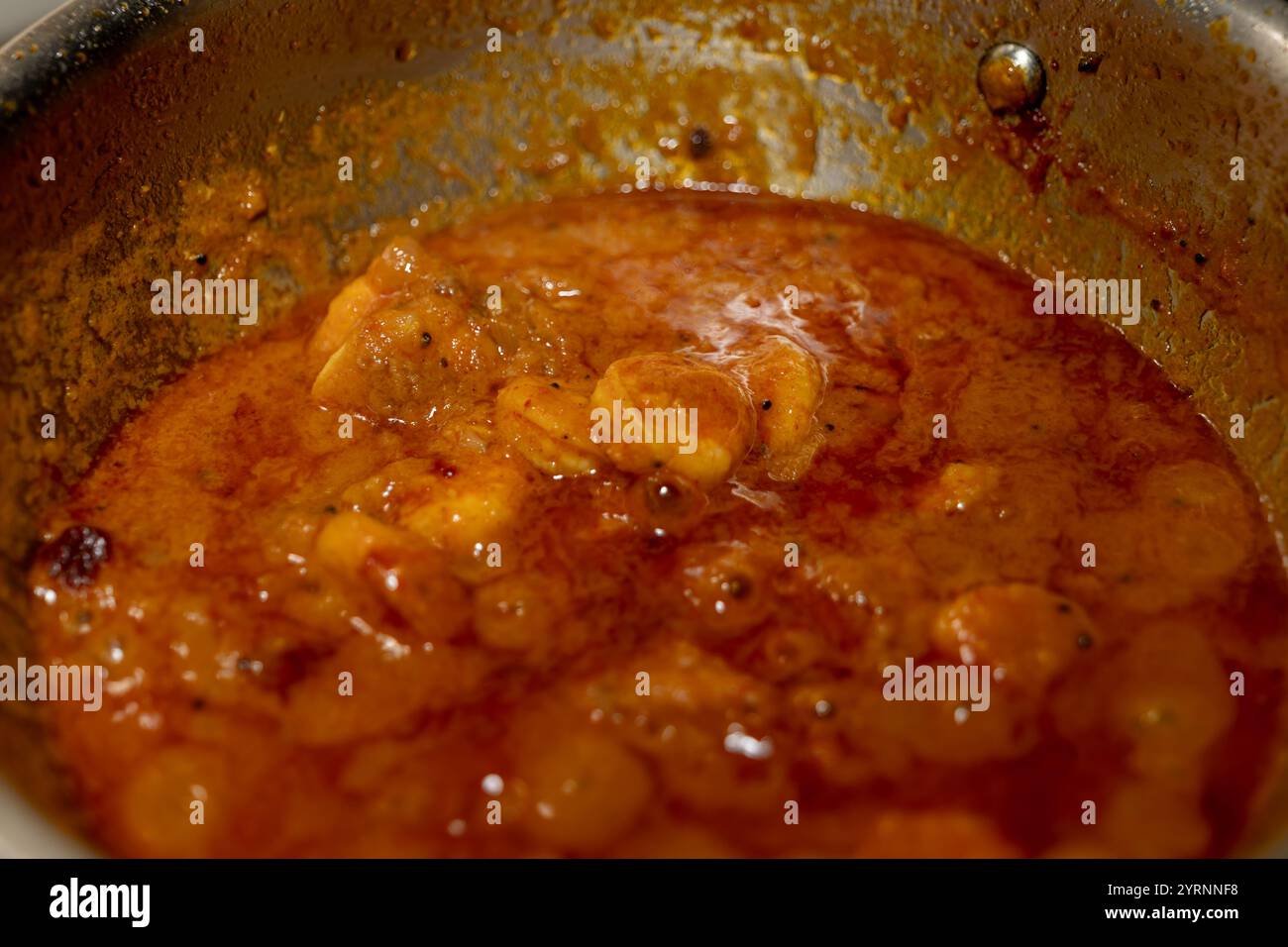 Delicious chicken simmering in flavorful hi-res stock photography and ...