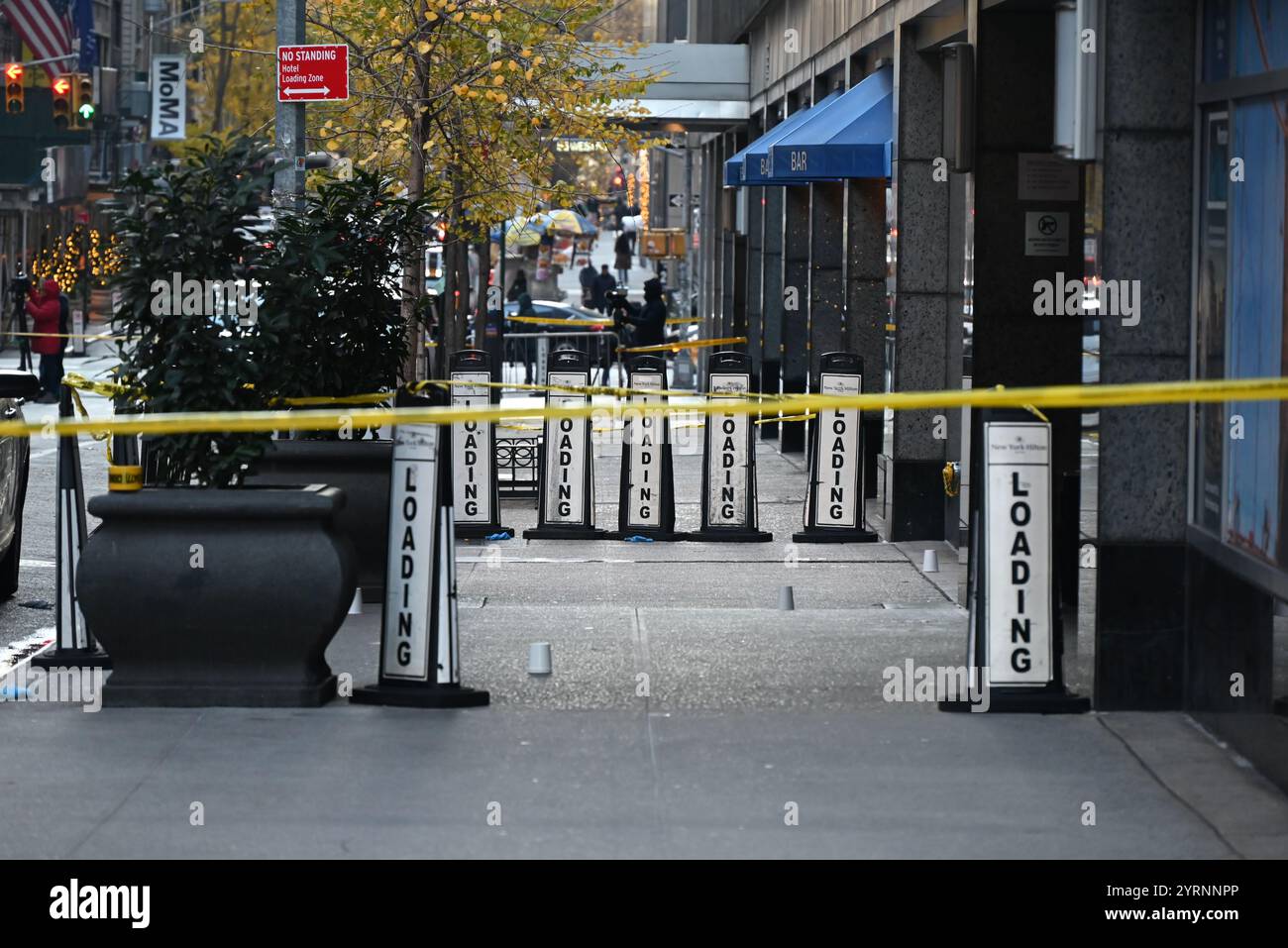 Midtown Manhattan, United States. 04th Dec, 2024. Police yellow tape ...