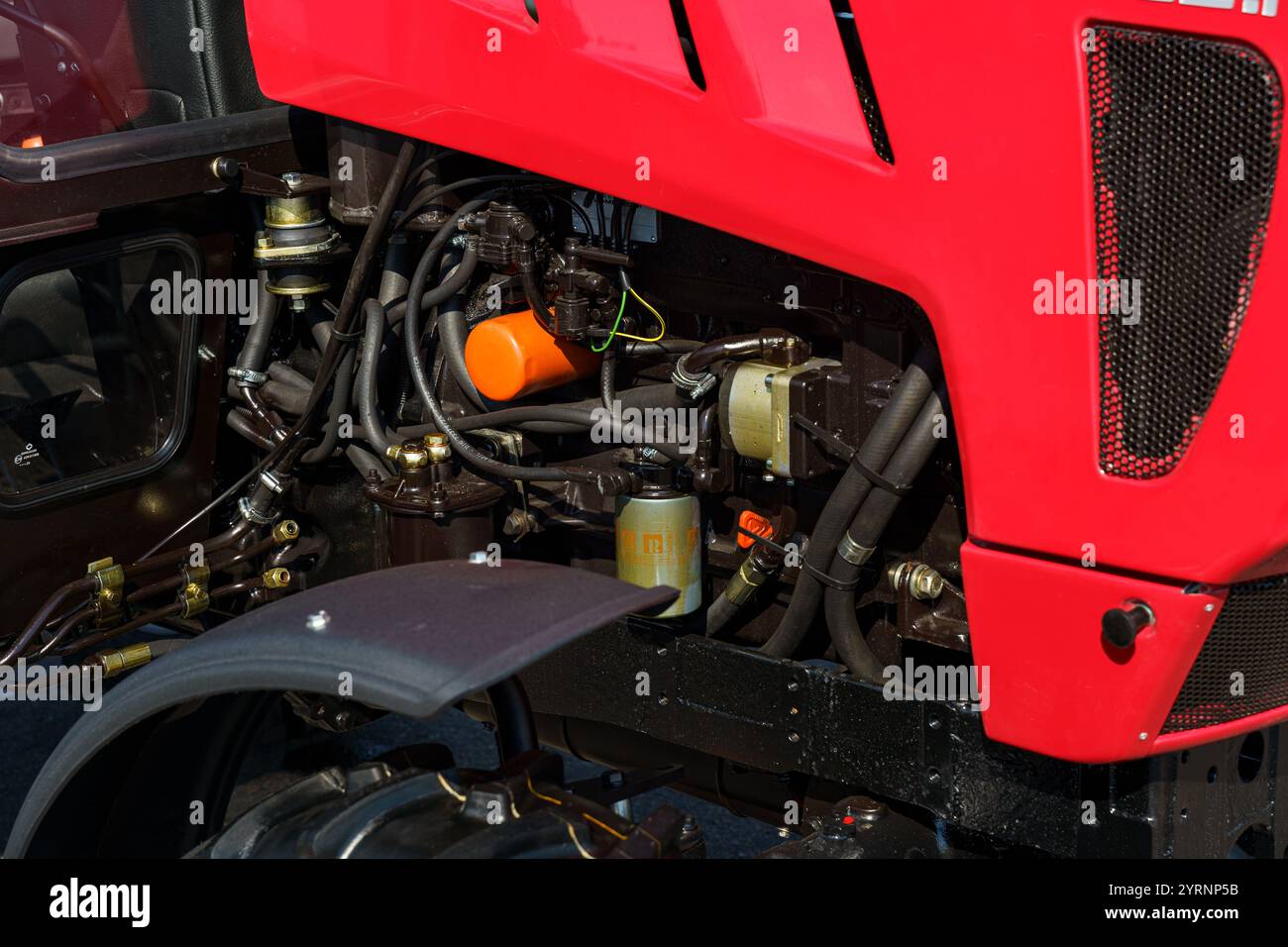 Bobruisk, Belarus - June 28, 2024: The heart of a robust red tractor ...