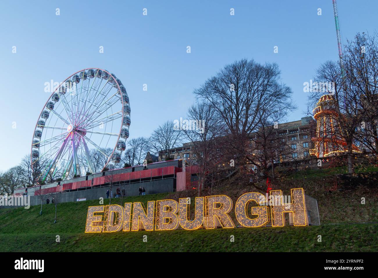 Large illuminated Edinburgh Sign and Ferris Wheel from Princes Street ...