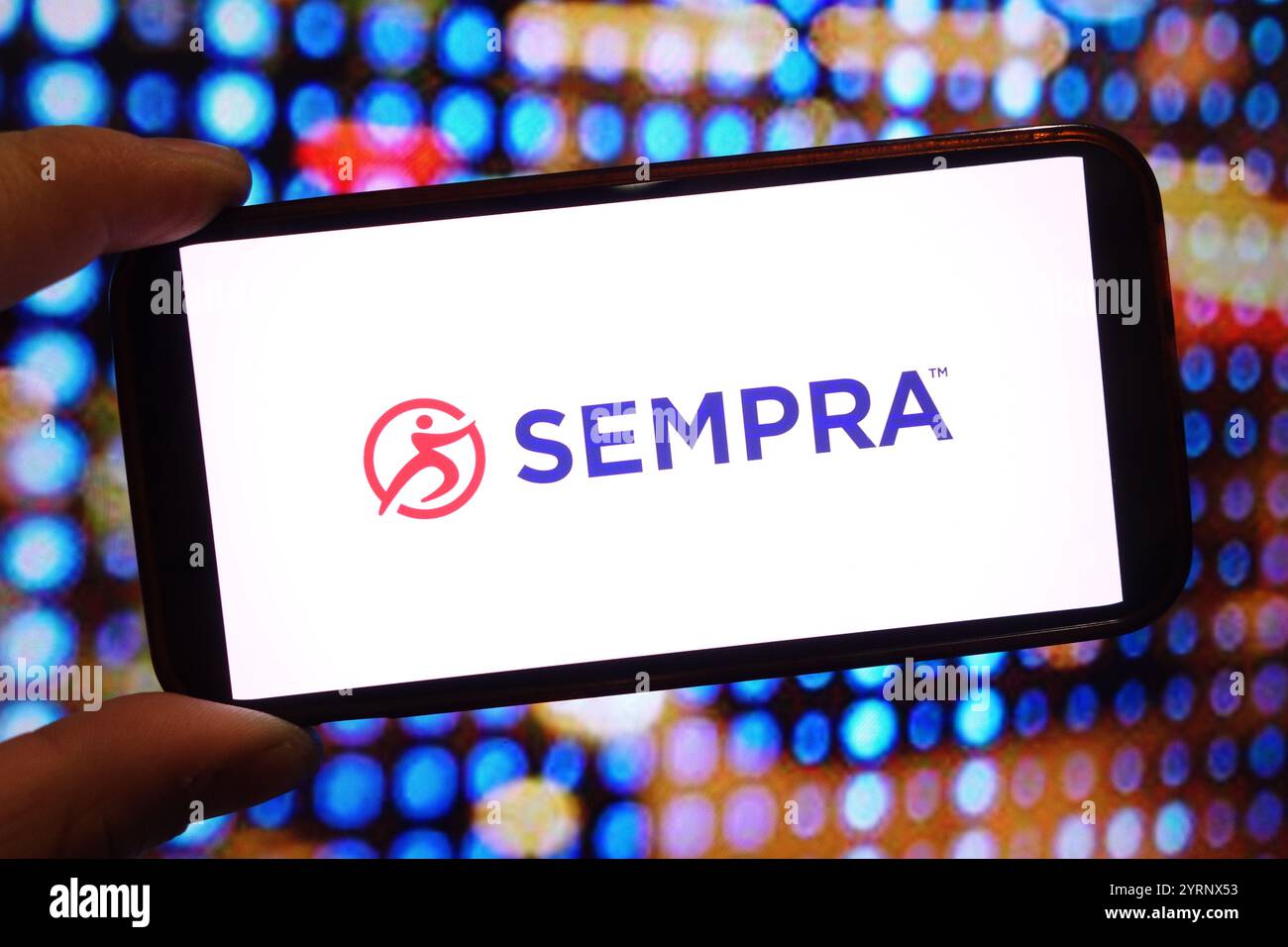 In this photo illustration, the Sempra Energy company logo is seen ...