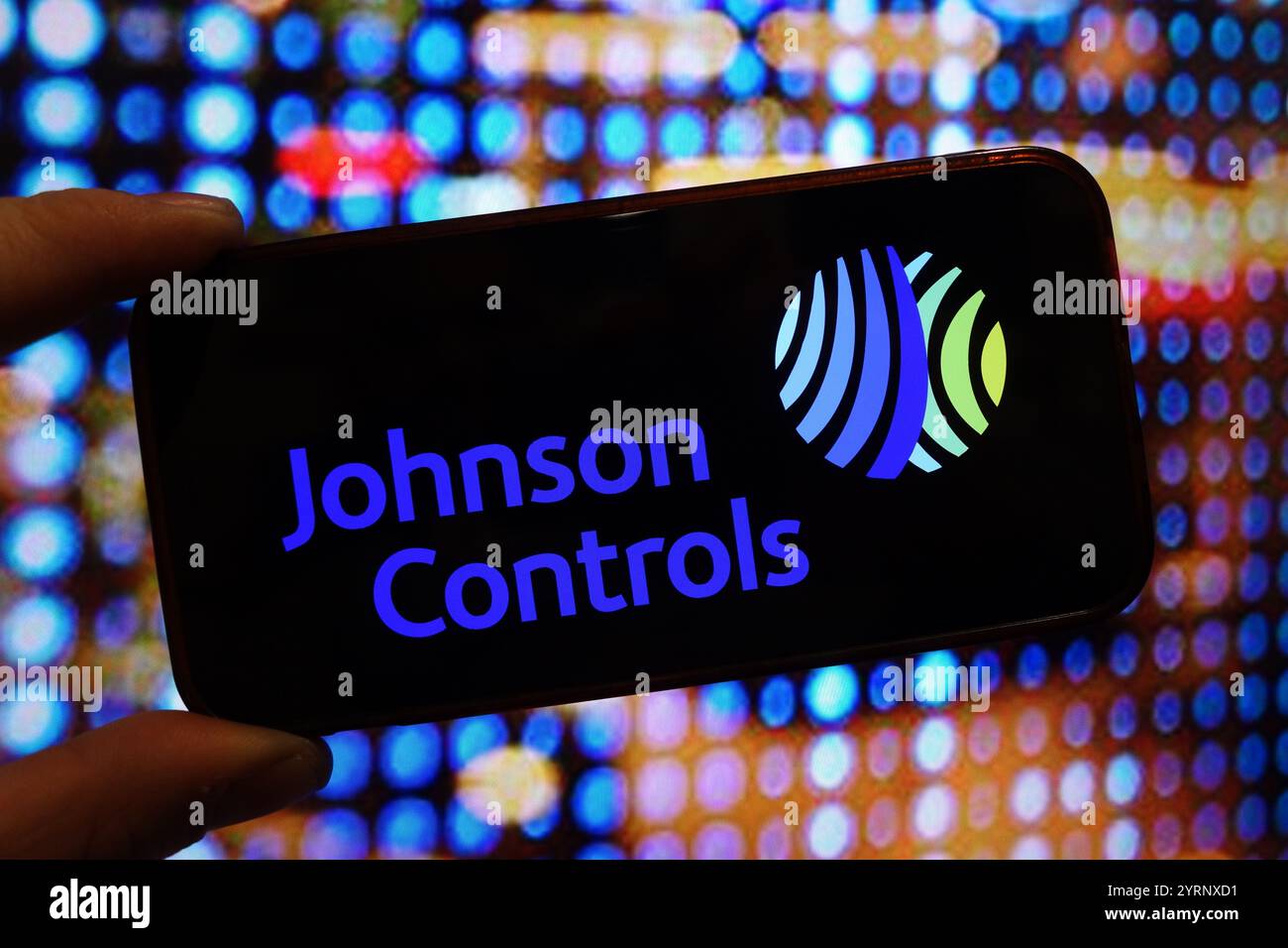 In this photo illustration, the Johnson Controls company logo is seen ...