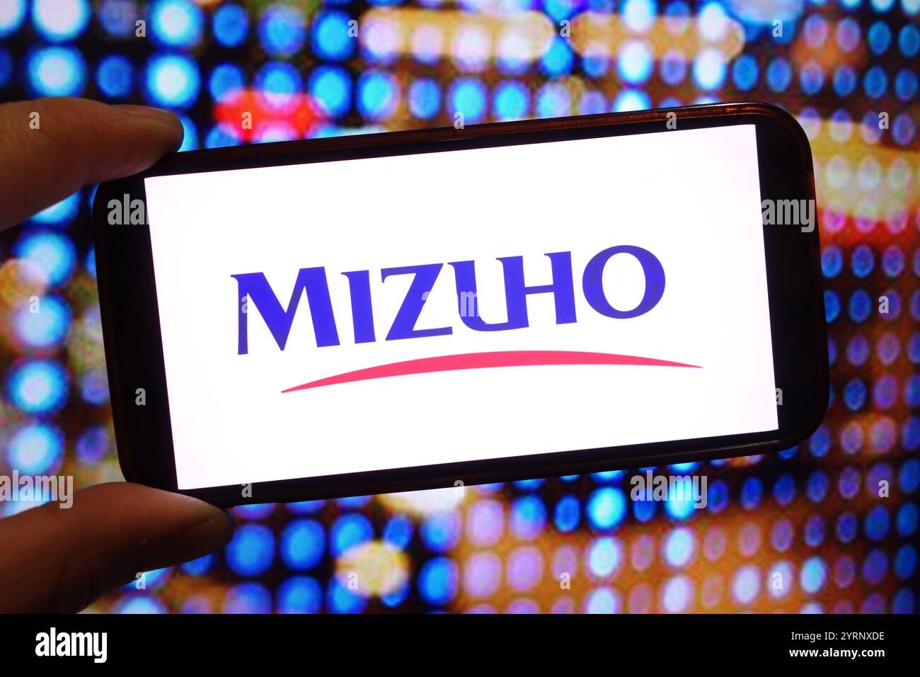 In this photo illustration, the Mizuho Financial Group company logo is ...