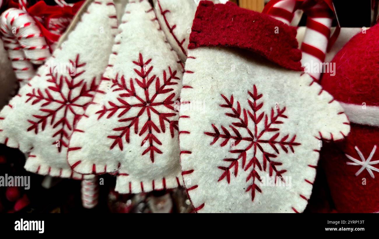 Image shows soft white mitten decorations Stock Photo - Alamy