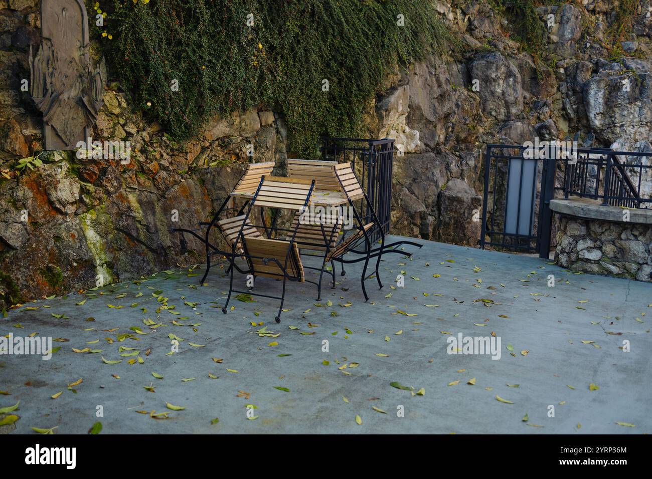 Outdoor dining patio with plants (empty, no people) restaurant outside ...