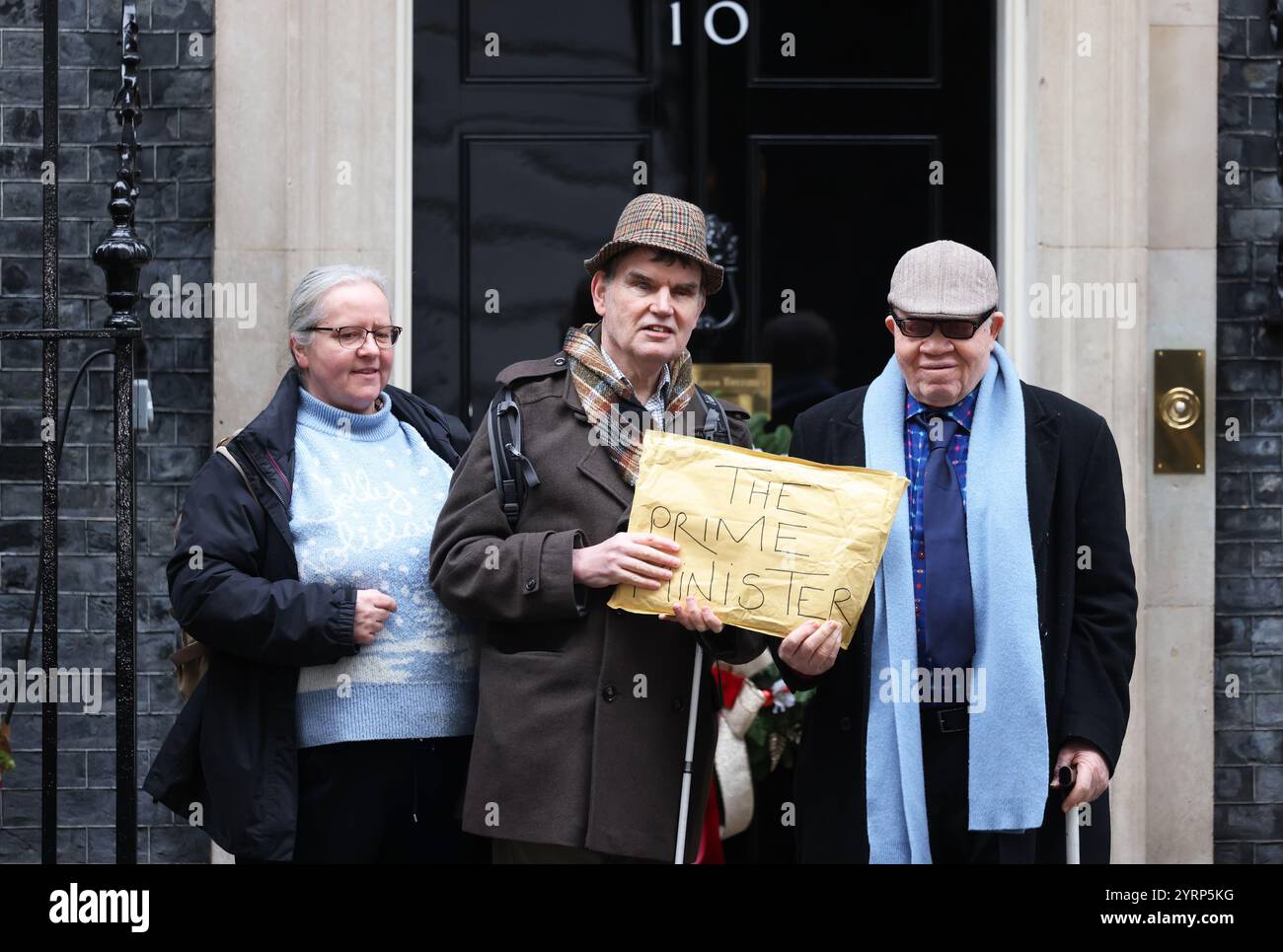 Group for the blind delivering a petition to Downing Street asking for ...