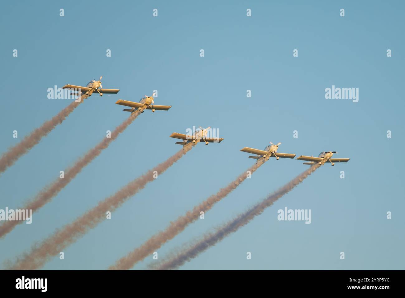 Stunt aerobatic planes performing stunts in air Stock Photo - Alamy