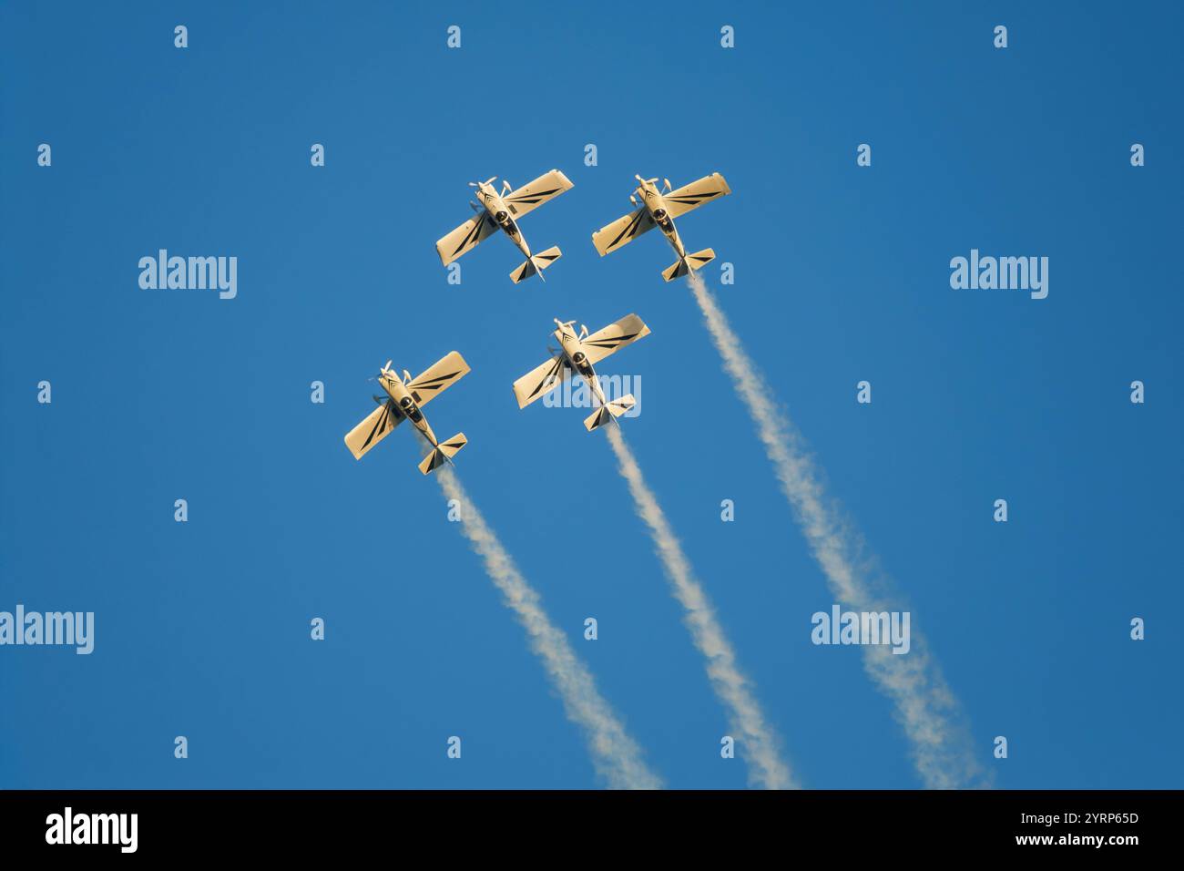 Stunt aerobatic planes performing stunts in air Stock Photo - Alamy