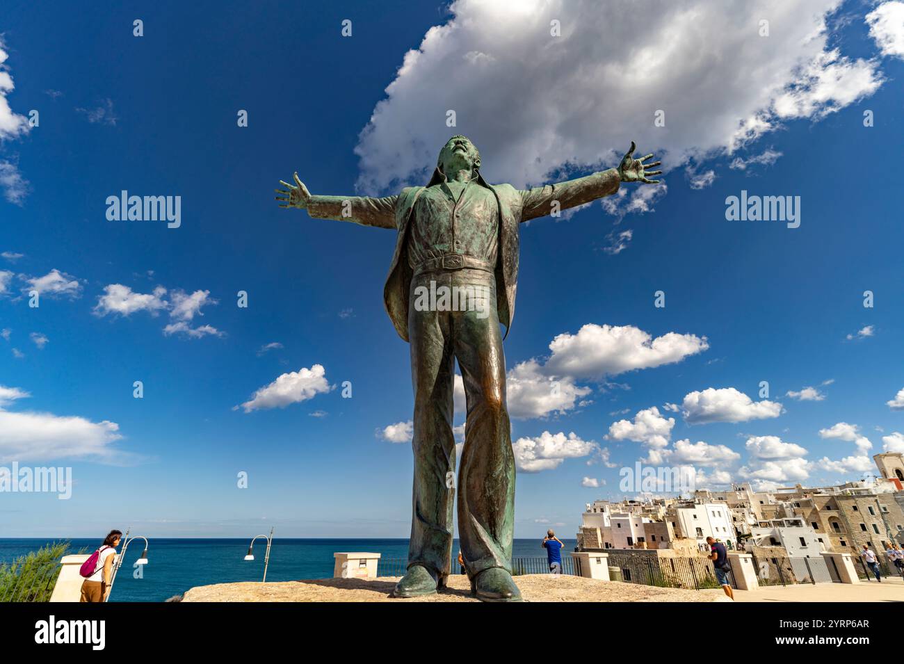 Statue of singer Domenico Modugno, Polignano a Mare, Apulia, Italy ...
