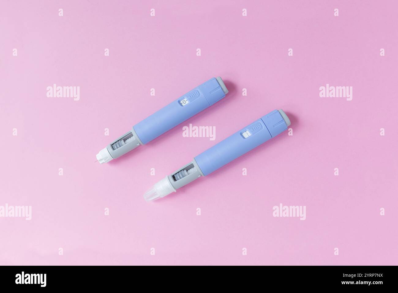 medical drug Ozempic injection lies on a pink background, top view ...