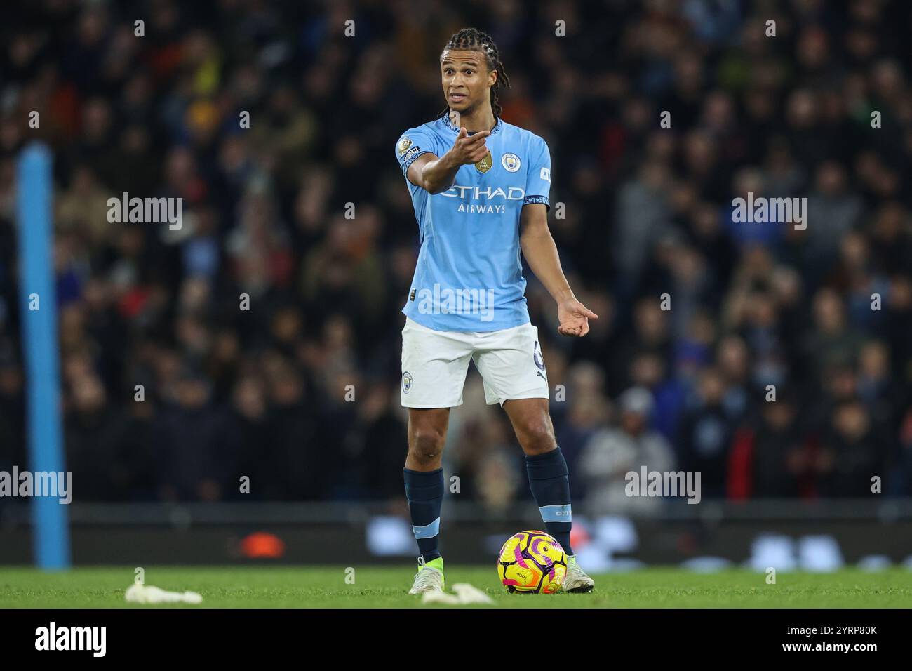 Nathan Aké of Manchester City gives his team instructions during the ...