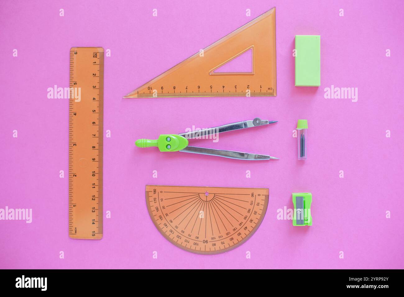 Green Set of geometry tools with compass, rulers, sharpener and eraser ...